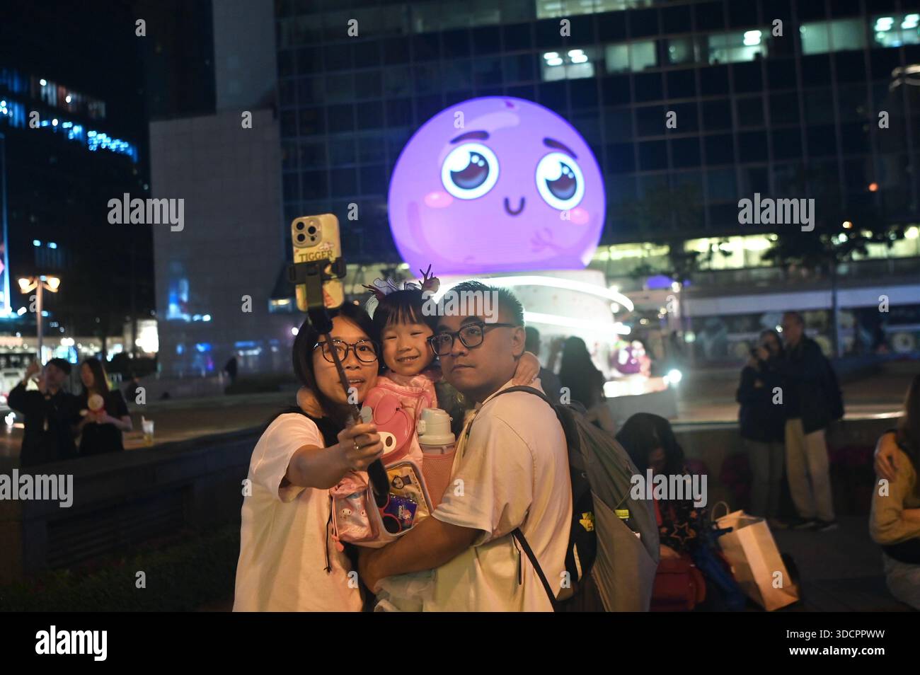 The visitors posing with the Little Grape, the police Christmas ...