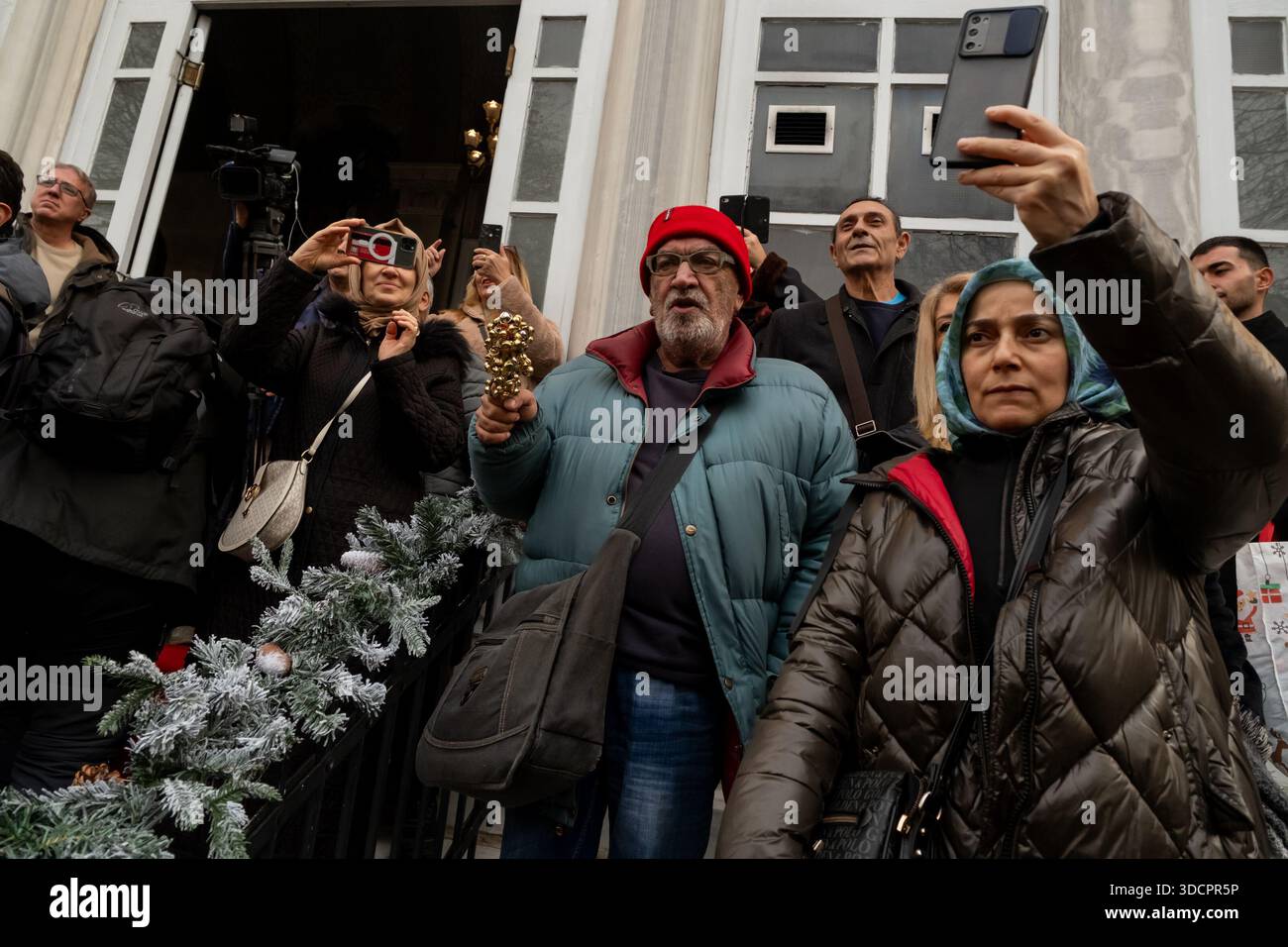 People seen taking photos at the garden of the Church of the Holy ...