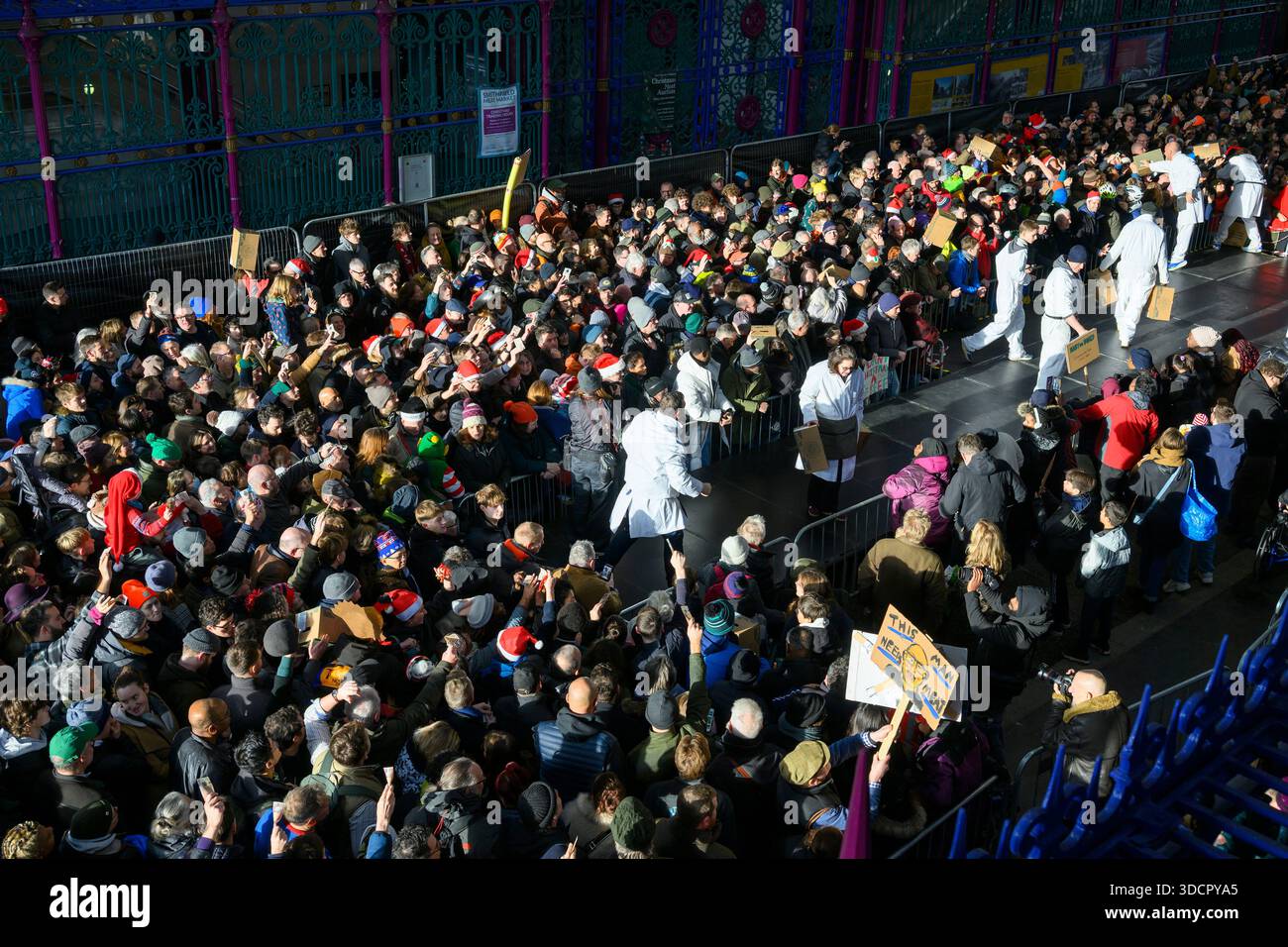 24/12/2025. London, UK Shoppers buy fresh meat produce from the ...