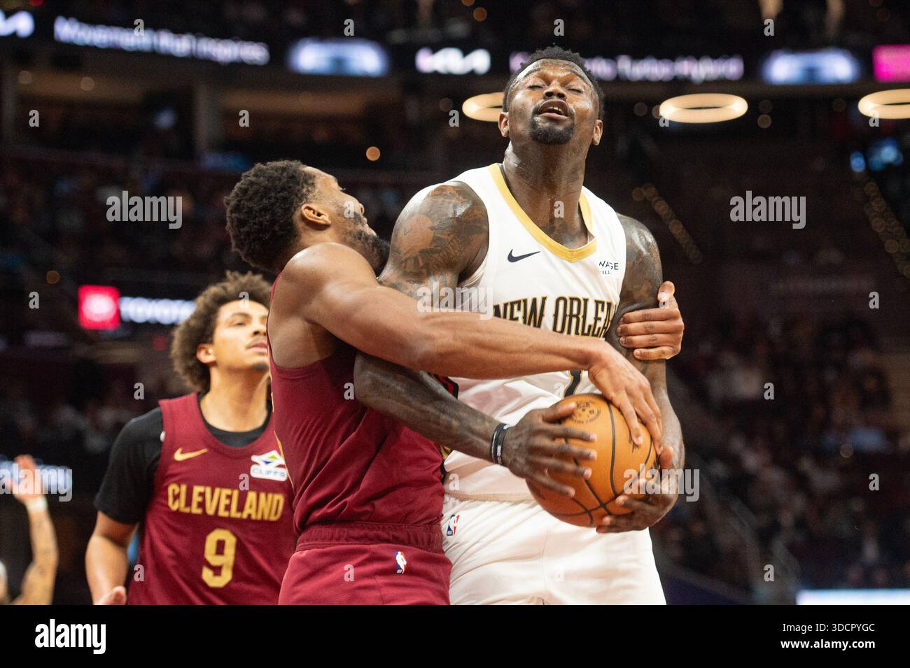 Cleveland Cavaliers' Donovan Mitchell, left, fouls New Orleans Pelicans ...