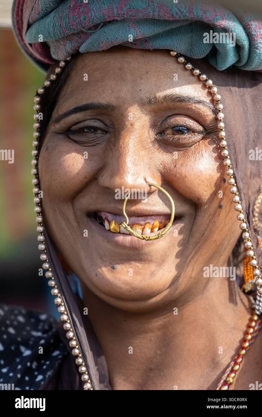 rural tribal woman smiling face with gold nose ring in ethnic ...