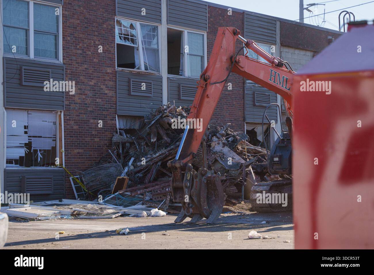 Rubble and debris cover the ground around Bristol Health & Rehab Center ...