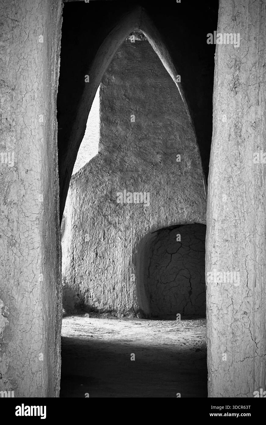 traditional Omani fort architecture with arched adobe walls, textured ...