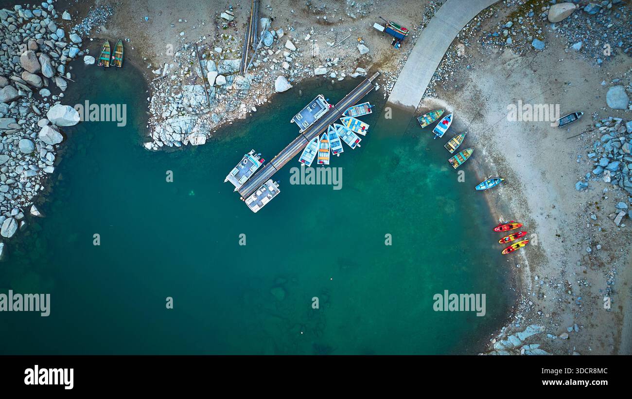 Aerial Lake Sabrina Dock Colorful Boats and Rocky Shoreline Top Down ...