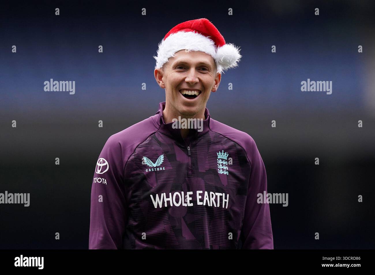 England's Zak Crawley smiles and wears a Santa hat during a nets ...