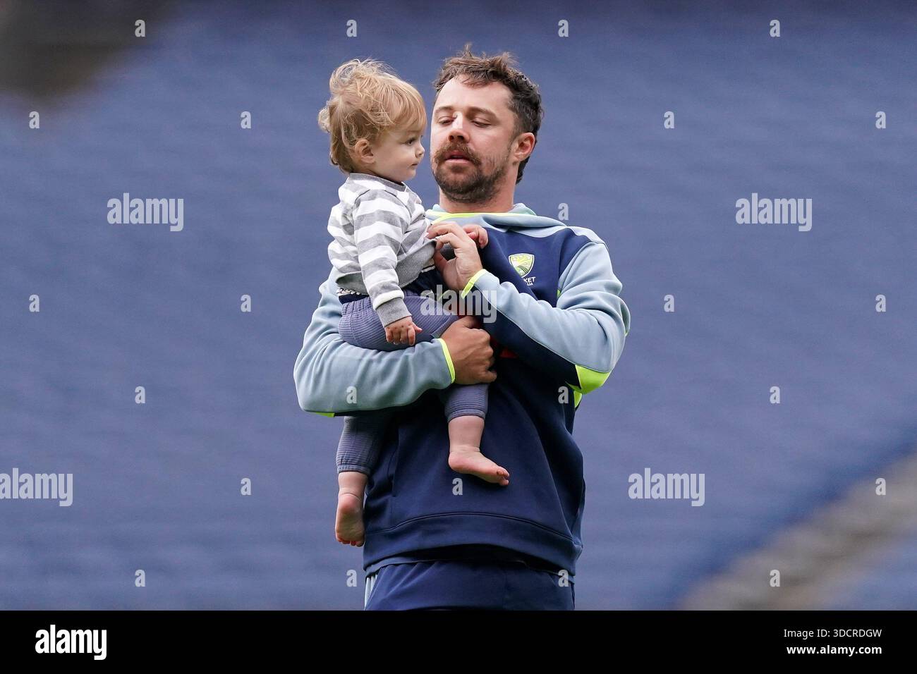 Australia's Travis Head with family during a nets session at the ...