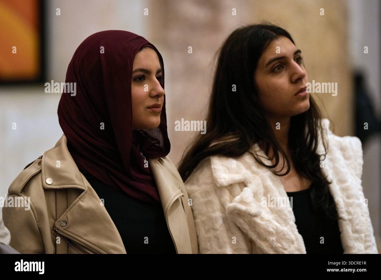 Muslim women attend a Christmas Eve Mass at St. George's Cathedral in ...
