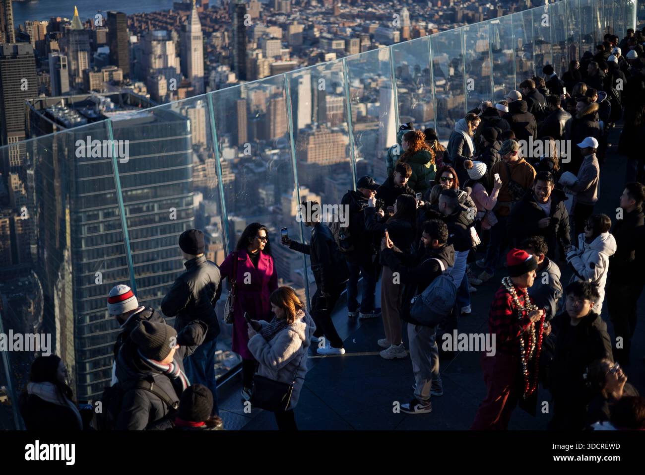 People gather at the Edge at Hudson Yards, Wednesday, Dec. 24, 2025, in ...