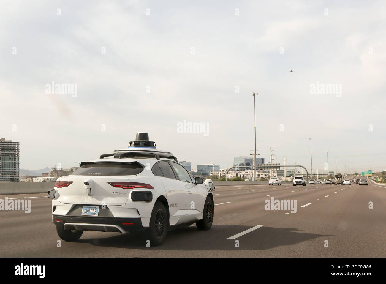 A Waymo car can be seen on the Loop 202 South Mountain Freeway in Tempe ...