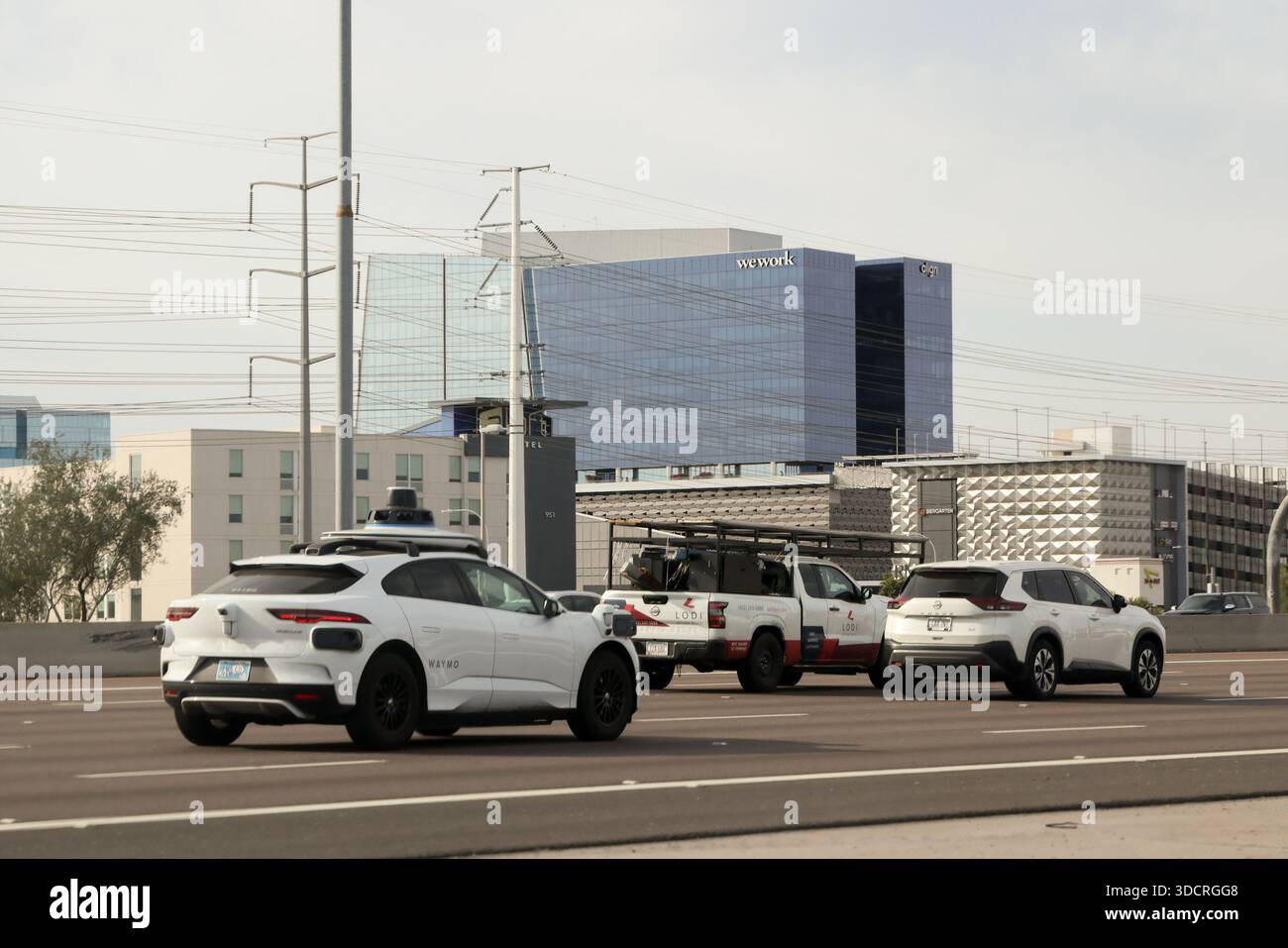 A Waymo car can be seen on the Loop 202 South Mountain Freeway in Tempe ...