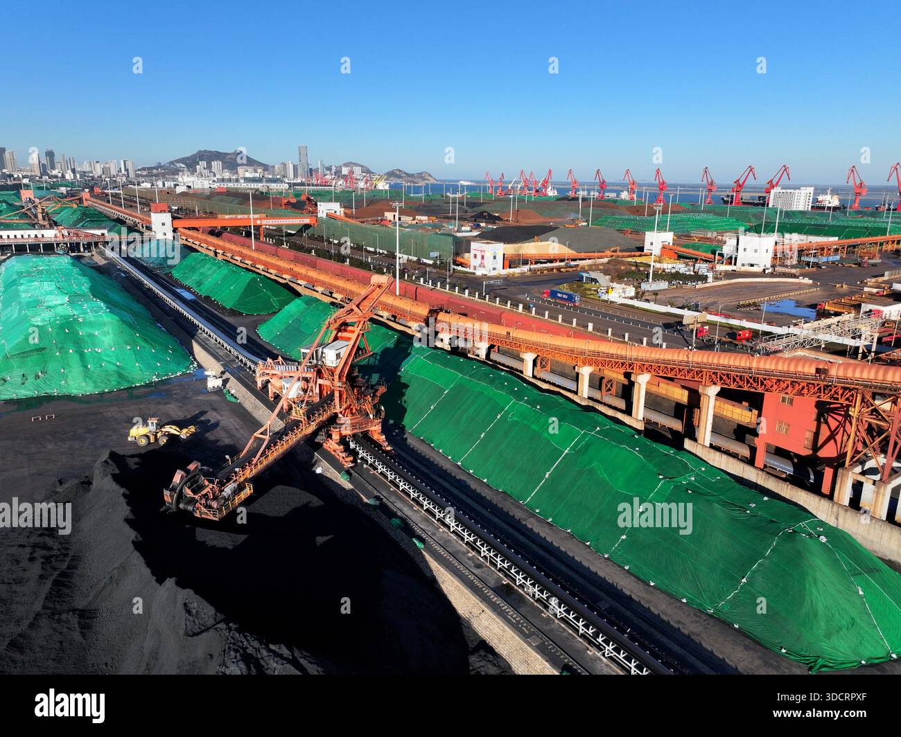 LIANYUNGANG, CHINA - DECEMBER 25, 2025 - Large scale machinery is ...