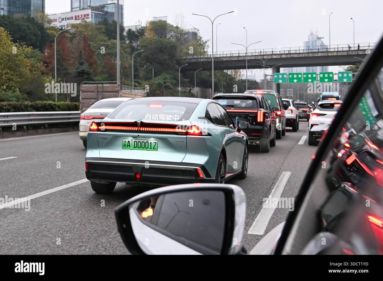Chongqing,China.24th December 2025. A vehicle bearing the license plate ...