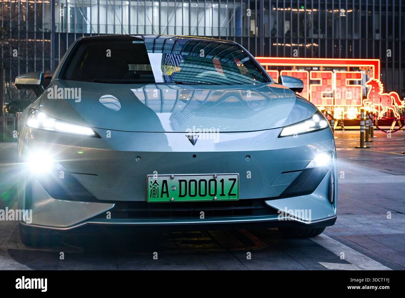 Chongqing,China.24th December 2025. A vehicle bearing the license plate ...