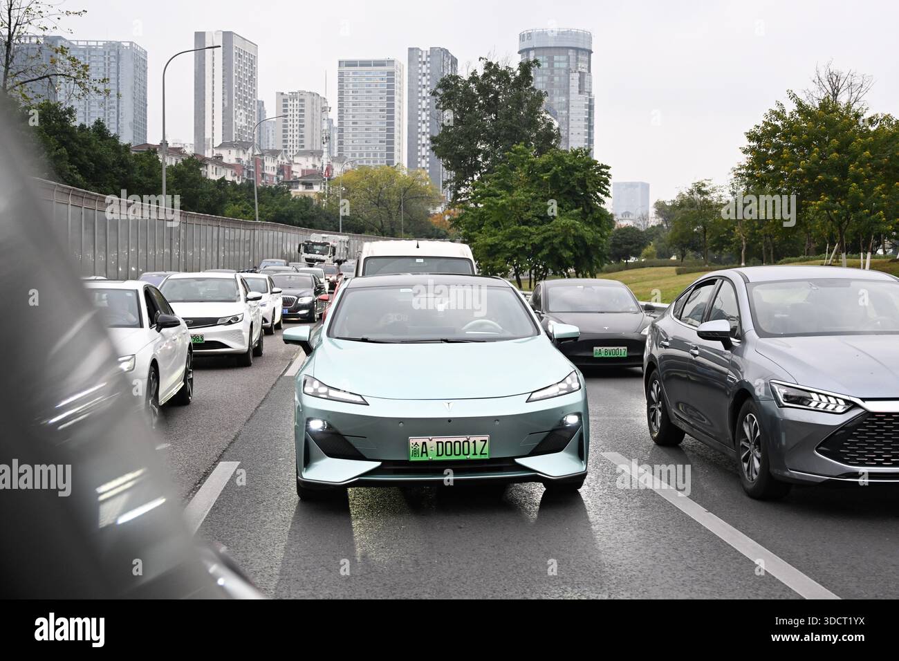 Chongqing,China.24th December 2025. A vehicle bearing the license plate ...