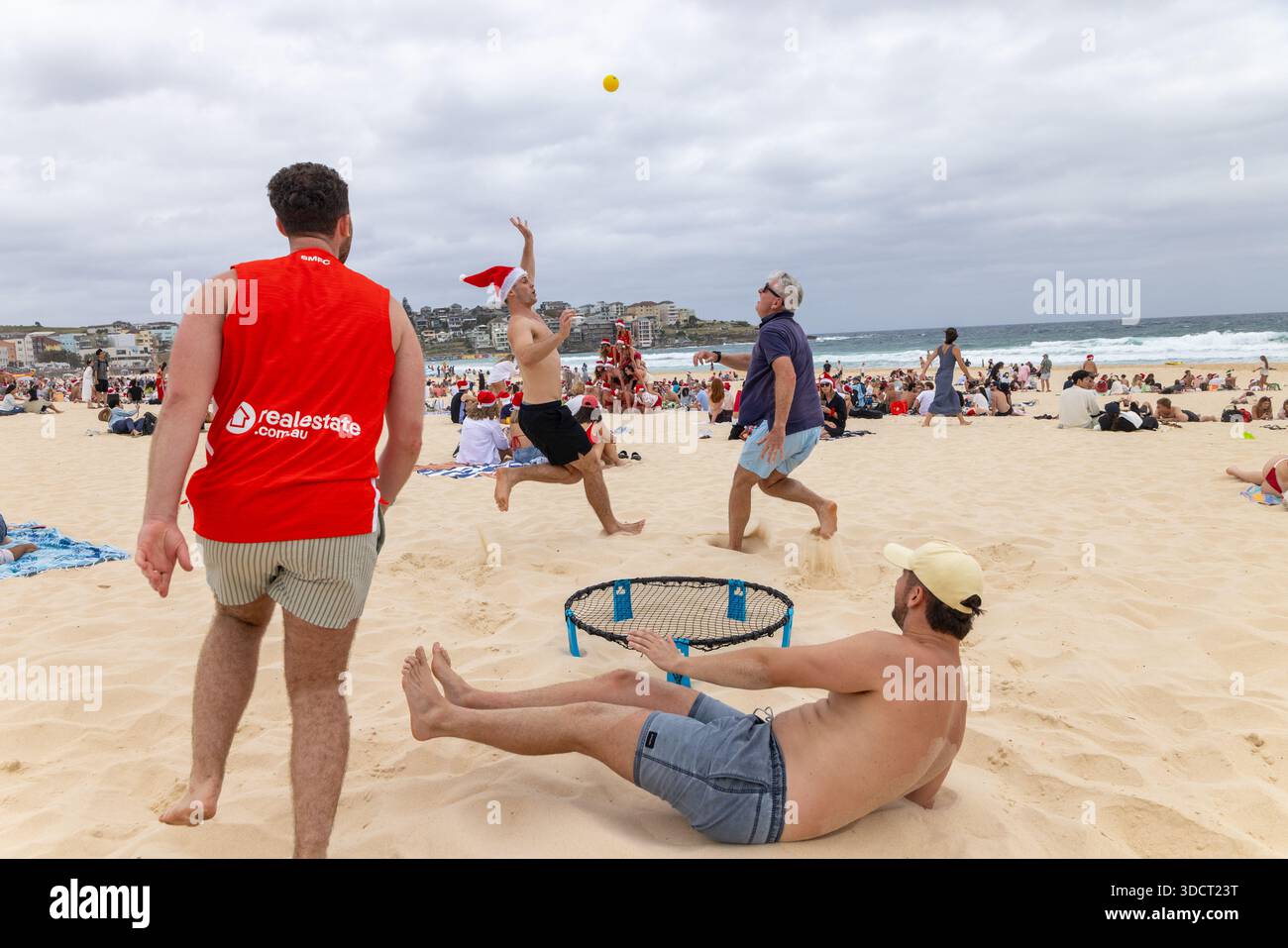 People gather on Christmas Day at Bondi Beach in Sydney, Thursday ...