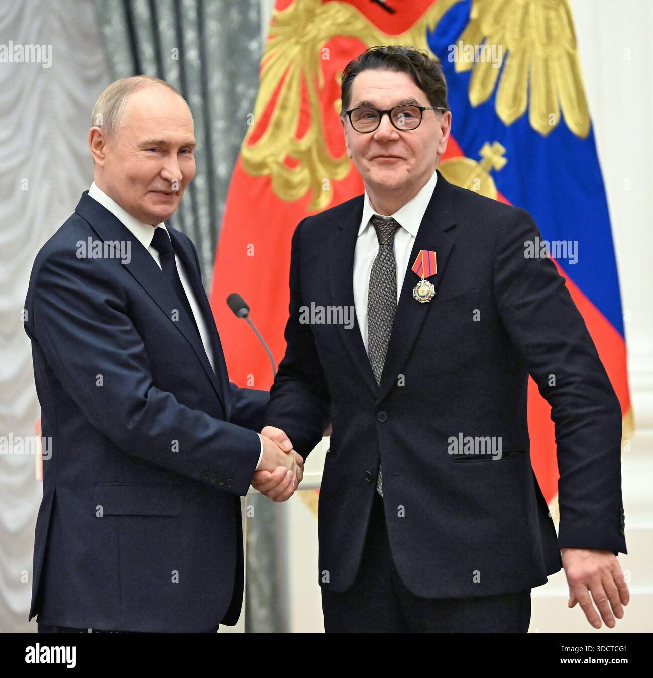 Russian President Vladimir Putin (left) and actor Sergei Makovetsky ...