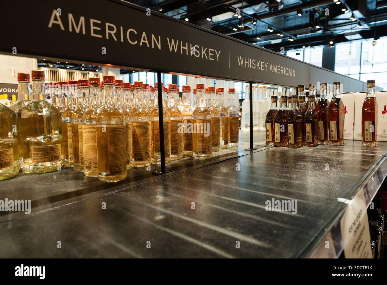 A half-empty shelf of American whiskey is pictured at the 100 Queenv¢¬Ä ...