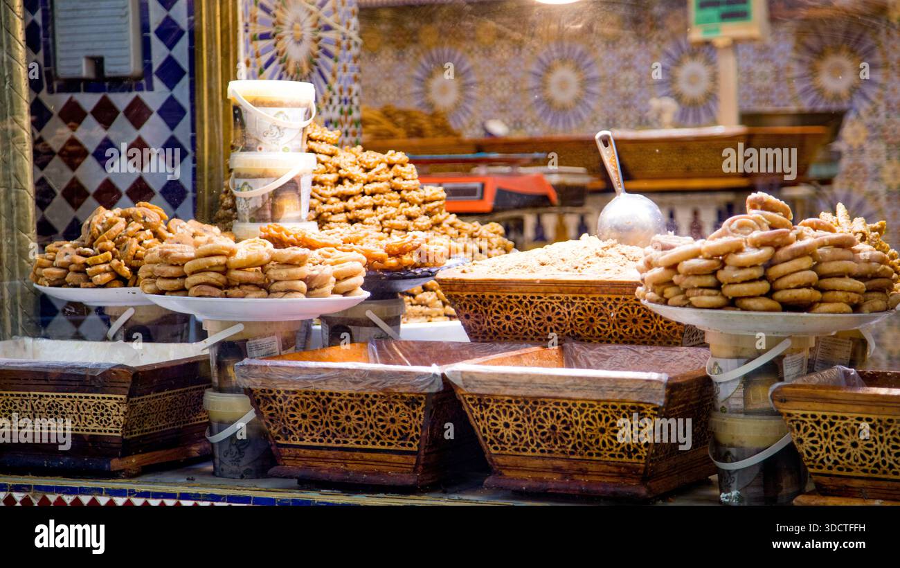 Display of traditional Moroccan pastries in Fez, showcasing honey ...