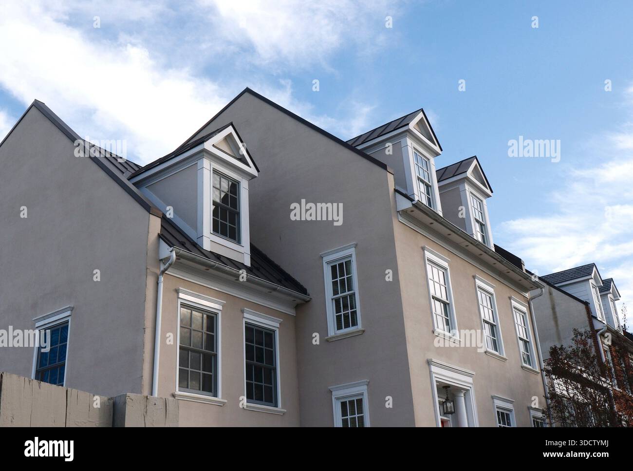 Building with roof angles and dormers Stock Photo - Alamy