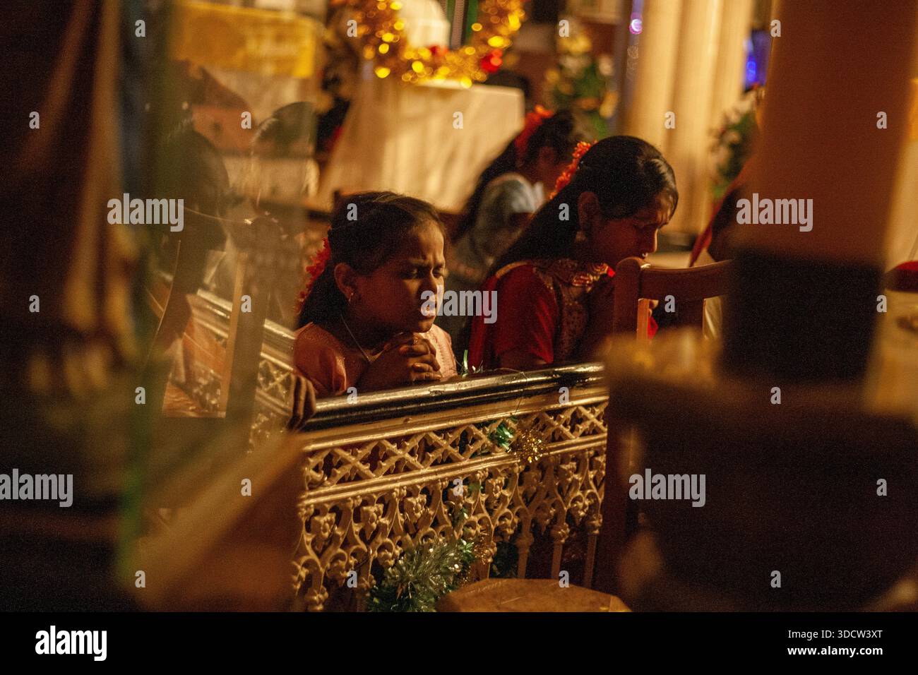 December 25, 2025, Bengaluru, Karnataka, India: Girls seen praying ...