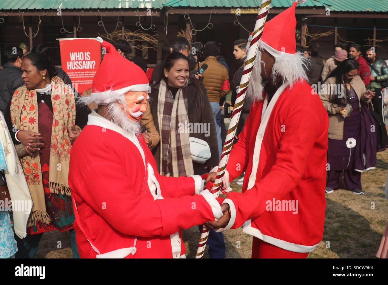 SRINAGAR, INDIA - DECEMBER 25: A man dressed as a Santa Claus outside ...