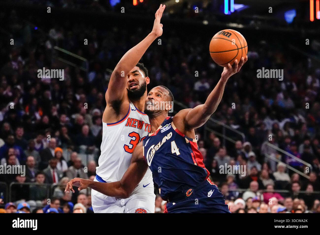 Cleveland Cavaliers center Evan Mobley (4) attempts to shoot over New ...