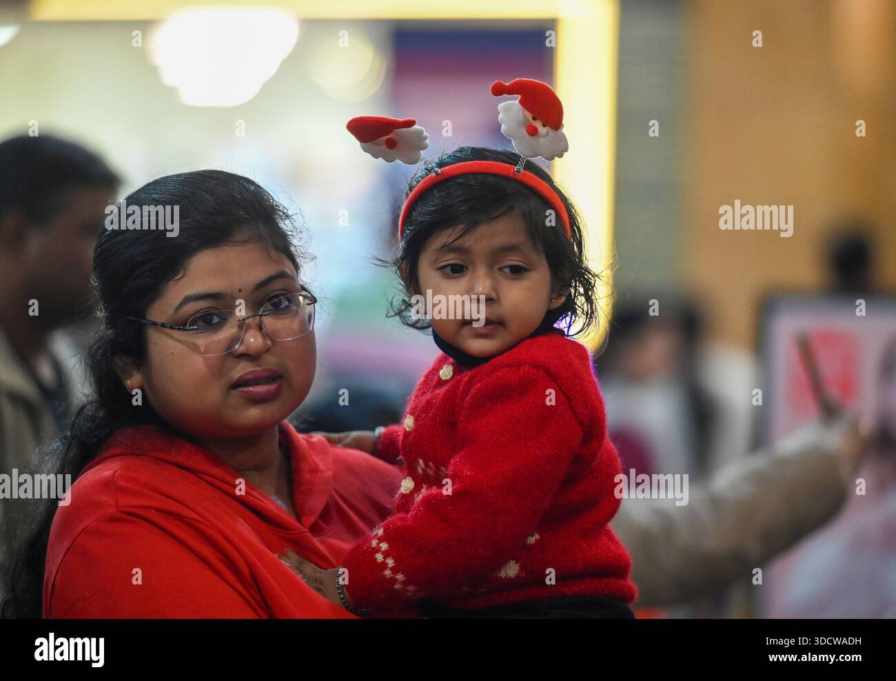 NOIDA, INDIA - DECEMBER 25: Children dressed as Santa Claus at GIP Mall ...