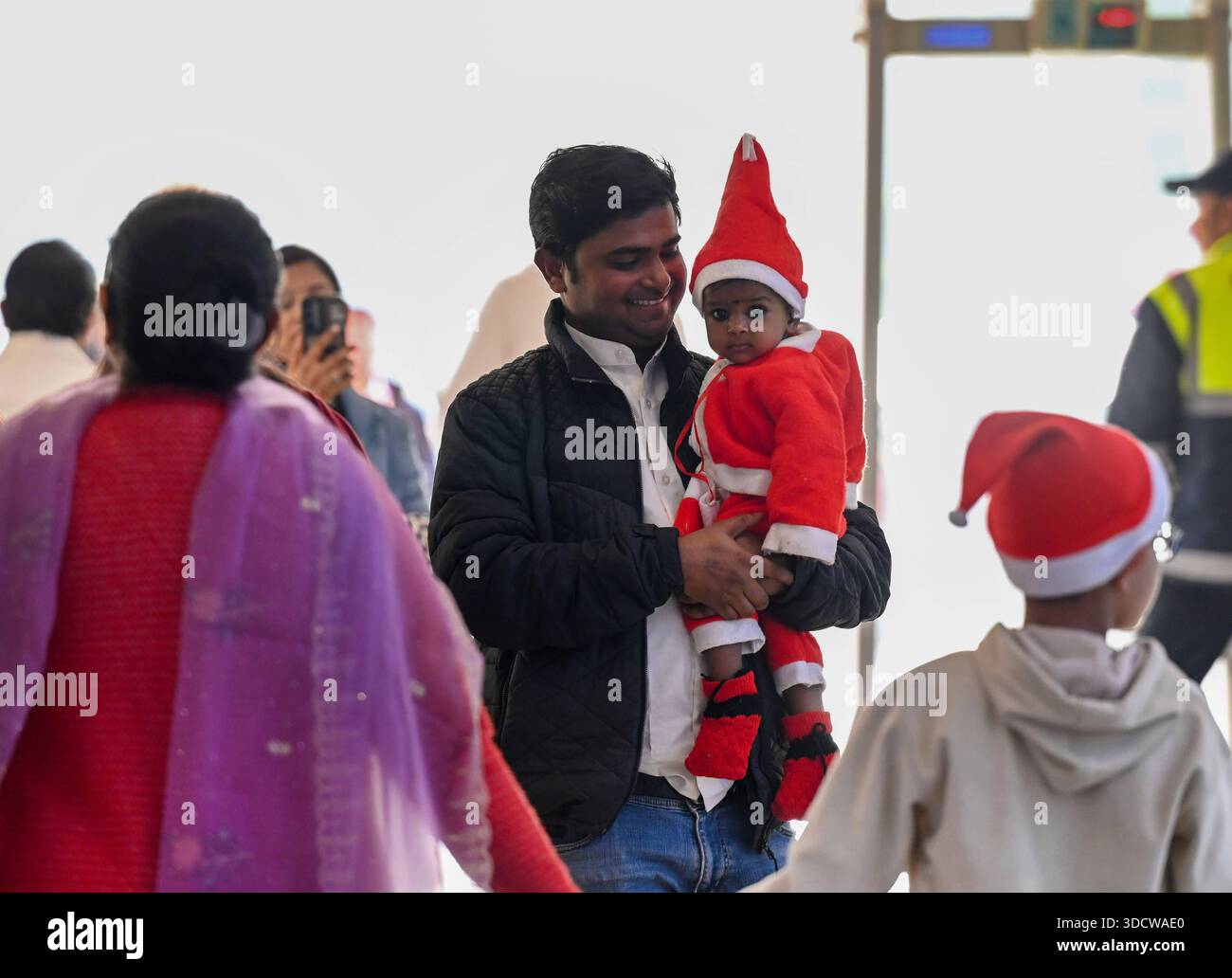 NOIDA, INDIA - DECEMBER 25: Children dressed as Santa Claus at GIP Mall ...