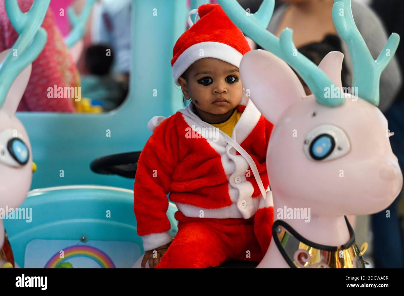 NOIDA, INDIA - DECEMBER 25: Children dressed as Santa Claus at GIP Mall ...