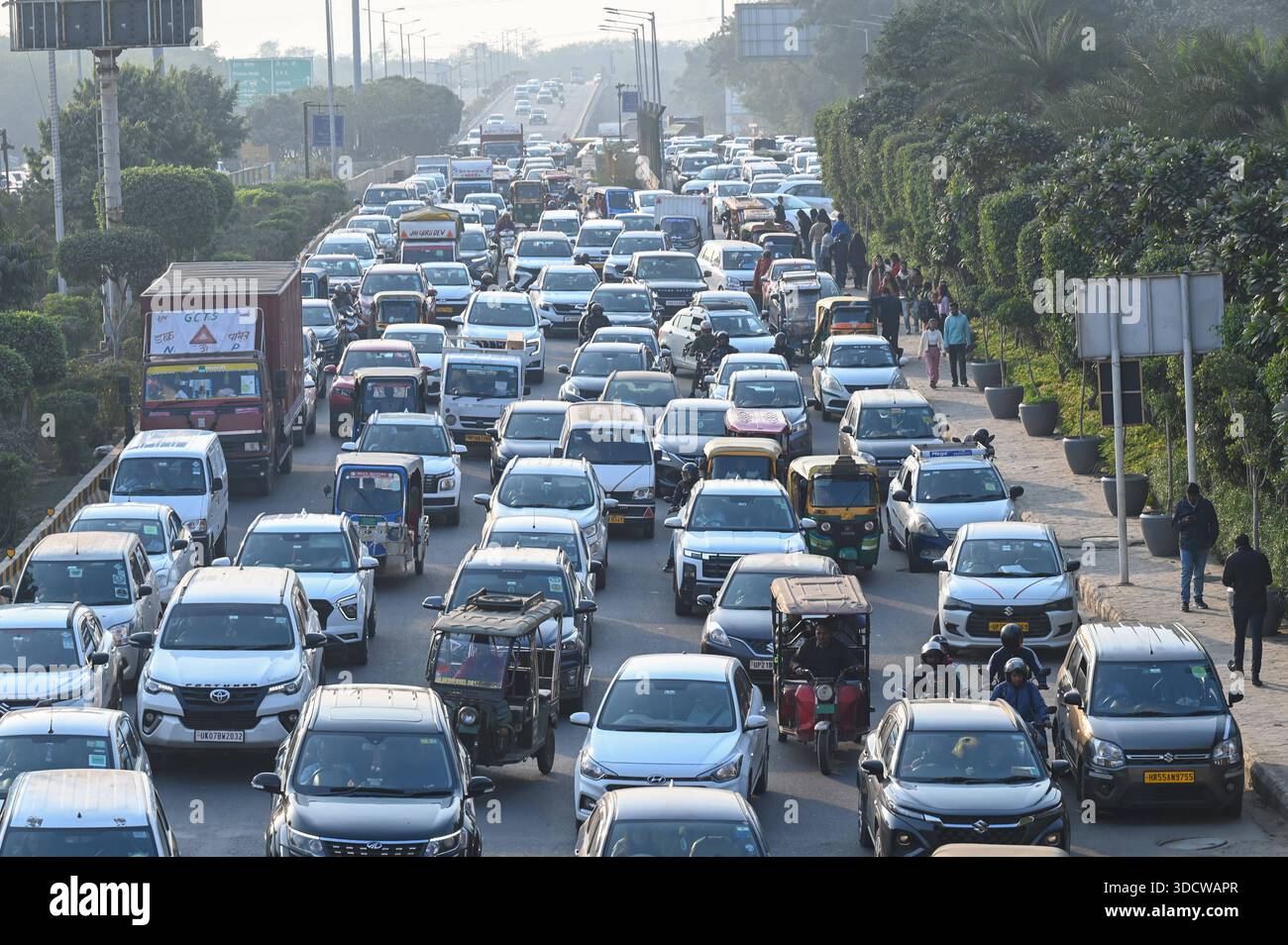 NOIDA, INDIA - DECEMBER 25: There was a huge traffic jam on Sector 18 ...