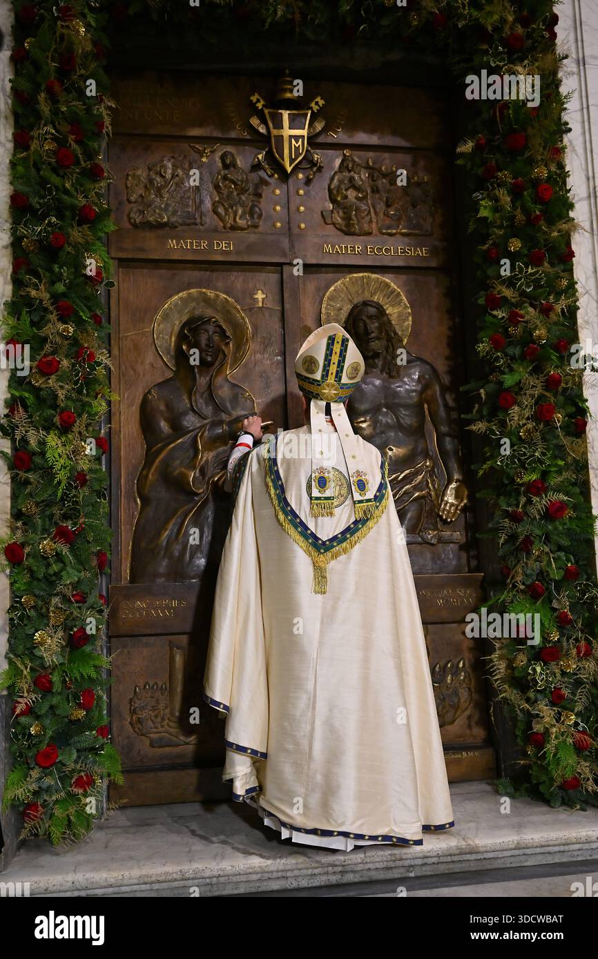 Lithuanian Cardinal Rolandas Makrickas closes the Holy door of the St ...