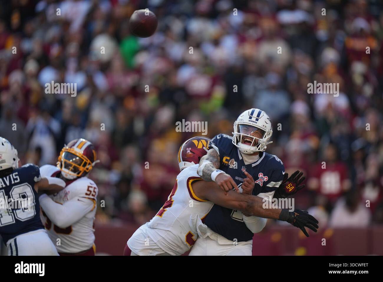 Dallas Cowboys quarterback Dak Prescott (4) is hit as he throws by ...