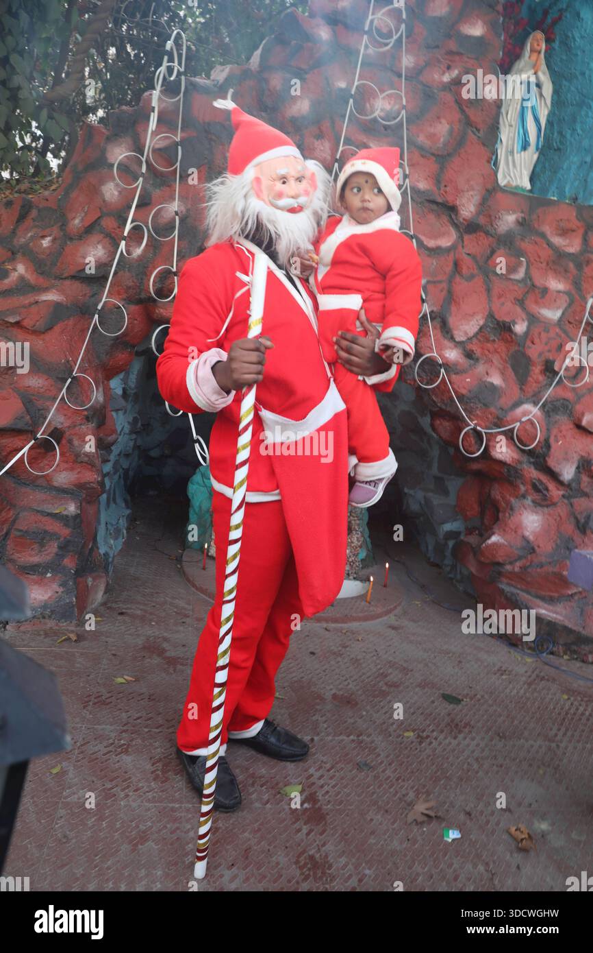 SRINAGAR, INDIA - DECEMBER 25: A man dressed as a Santa Claus outside ...