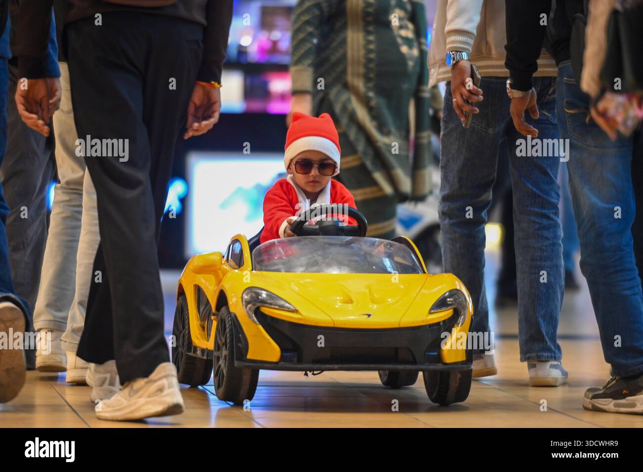 NOIDA, INDIA - DECEMBER 25: Children dressed as Santa Claus at GIP Mall ...