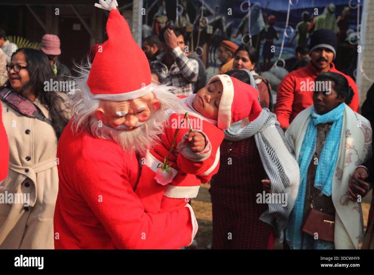 SRINAGAR, INDIA - DECEMBER 25: A man dressed as a Santa Claus outside ...