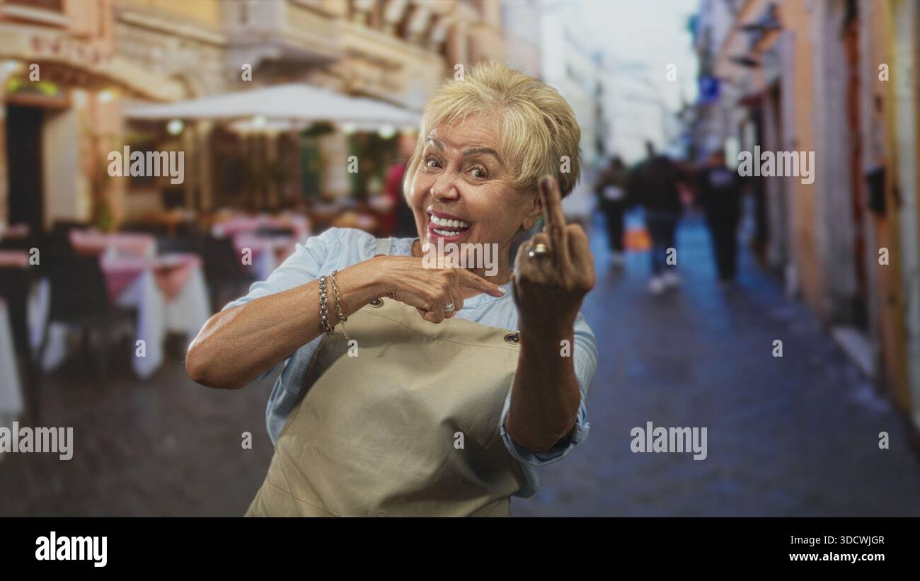 Woman apron points finger hi-res stock photography and images - Alamy