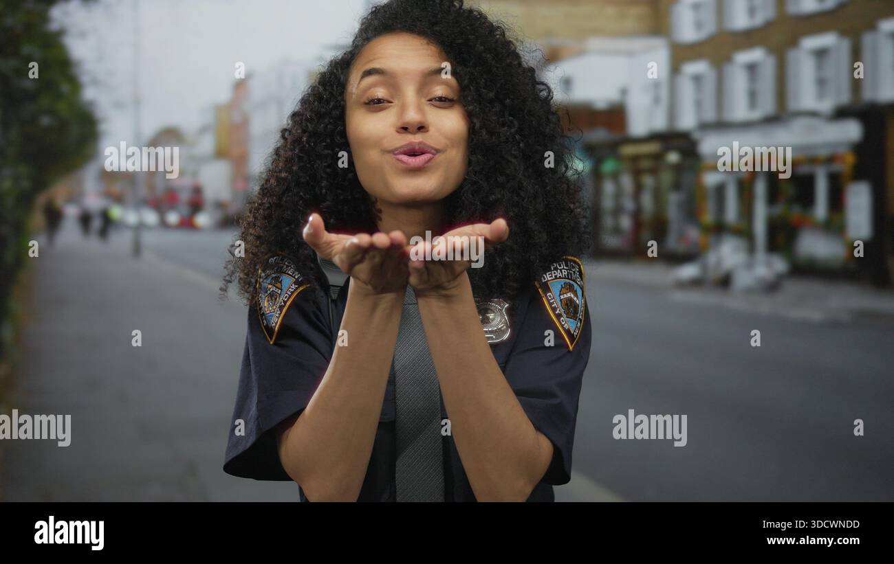 Female police officer presses hi-res stock photography and images - Alamy