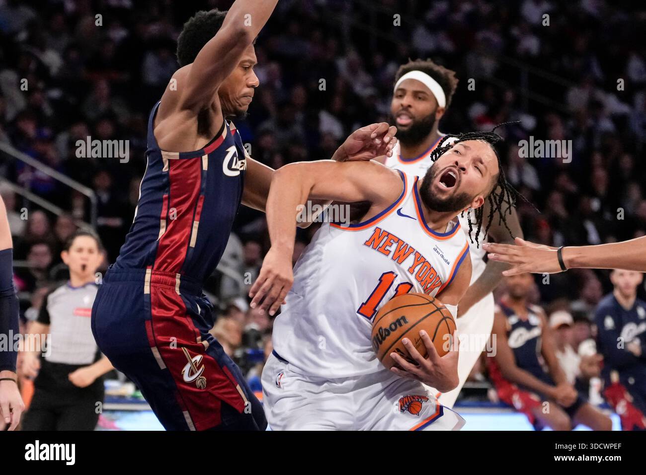 New York Knicks guard Jalen Brunson (11) drives past Cleveland ...