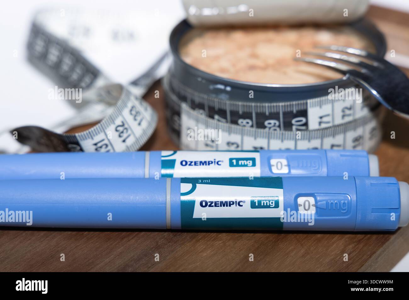 Weight loss concept featuring tuna fish and ozempic pen. Copenhagen ...
