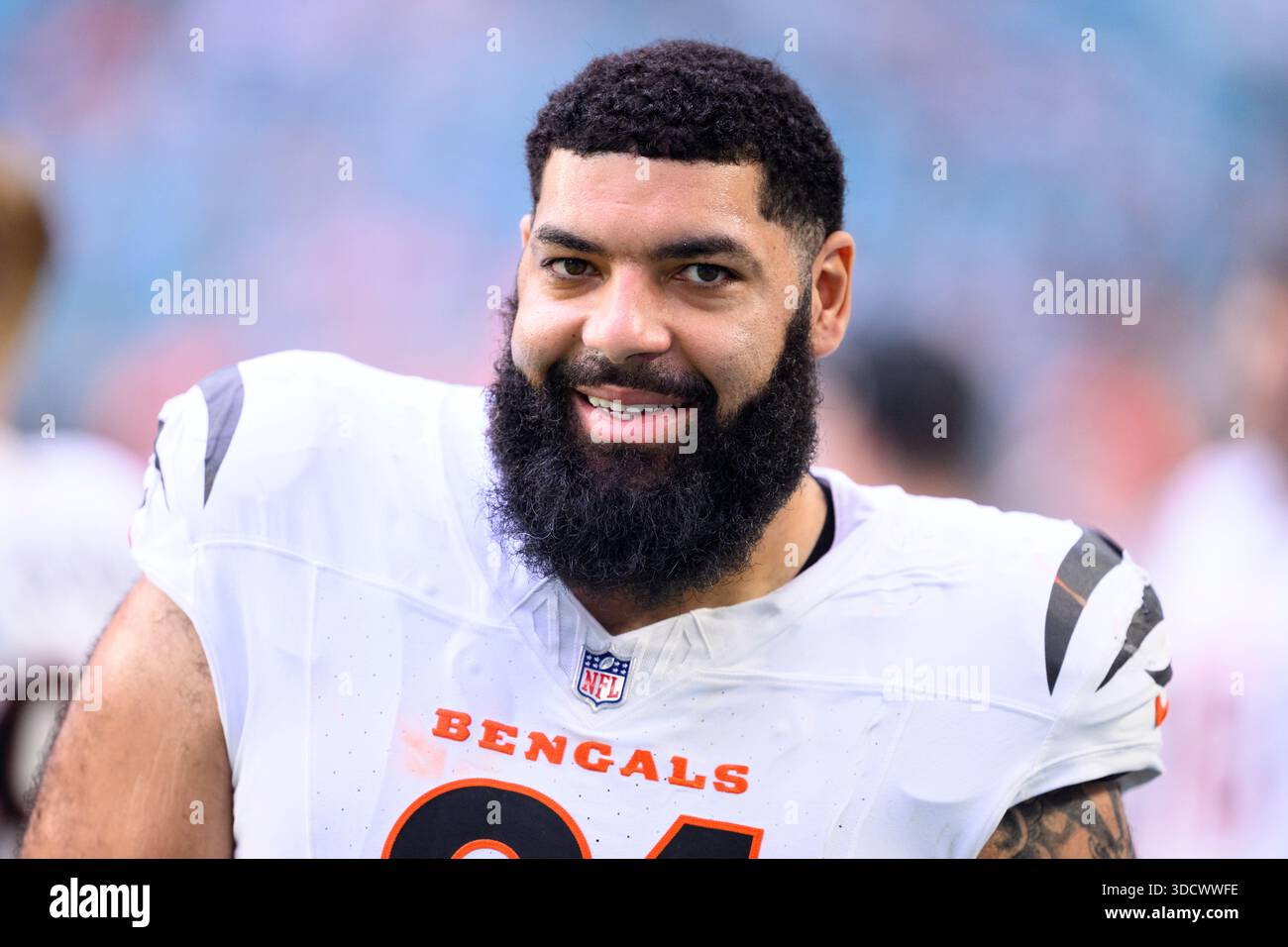 Cincinnati Bengals tackle Cody Ford (61) smiles on the sidelines during ...