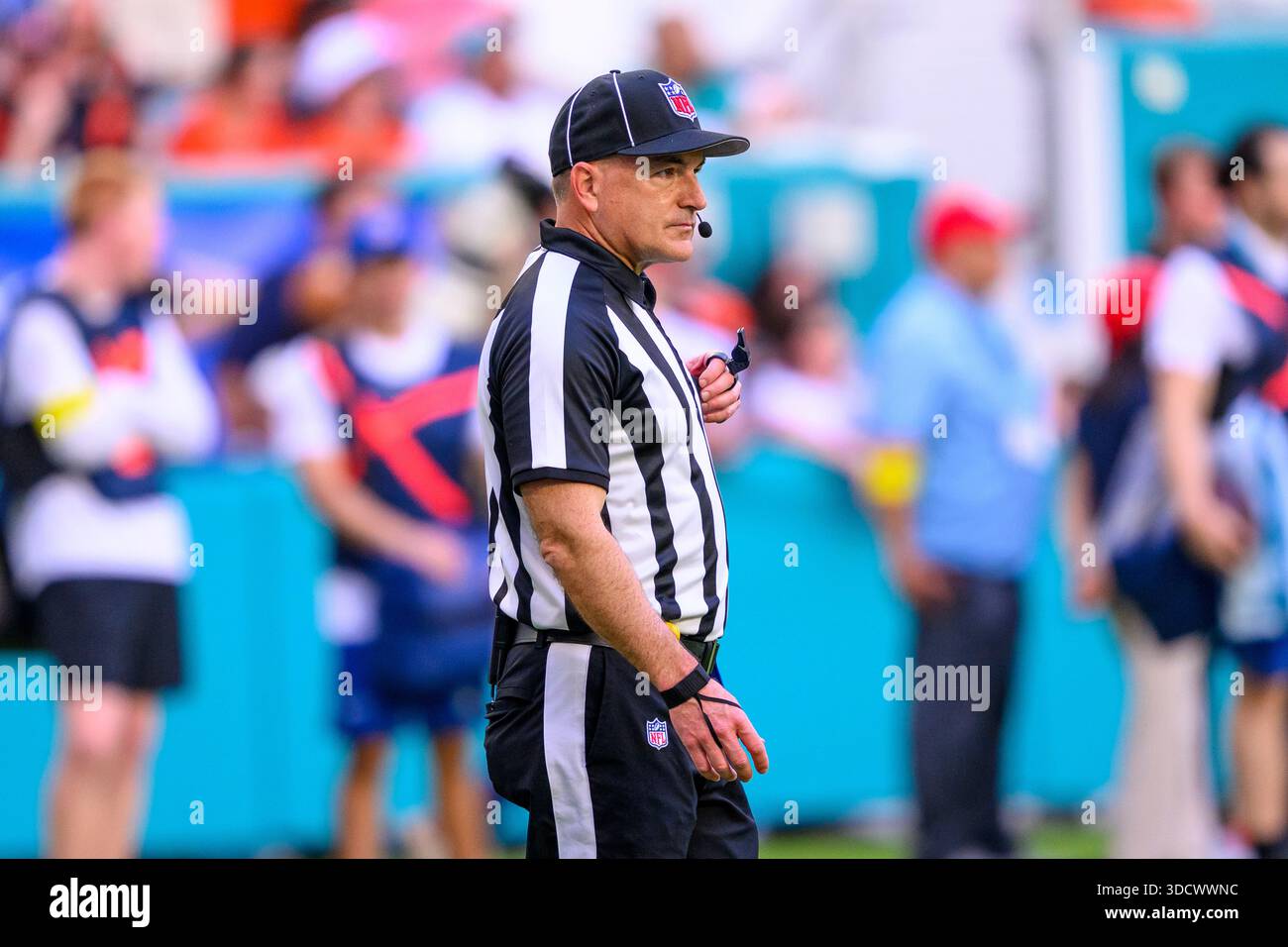 NFL umpire Duane Heydt stands on the field during an NFL football game ...