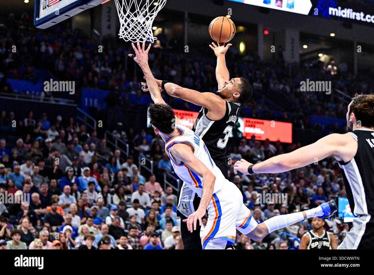 San Antonio Spurs Keldon Johnson (3) shoots against Oklahoma City ...