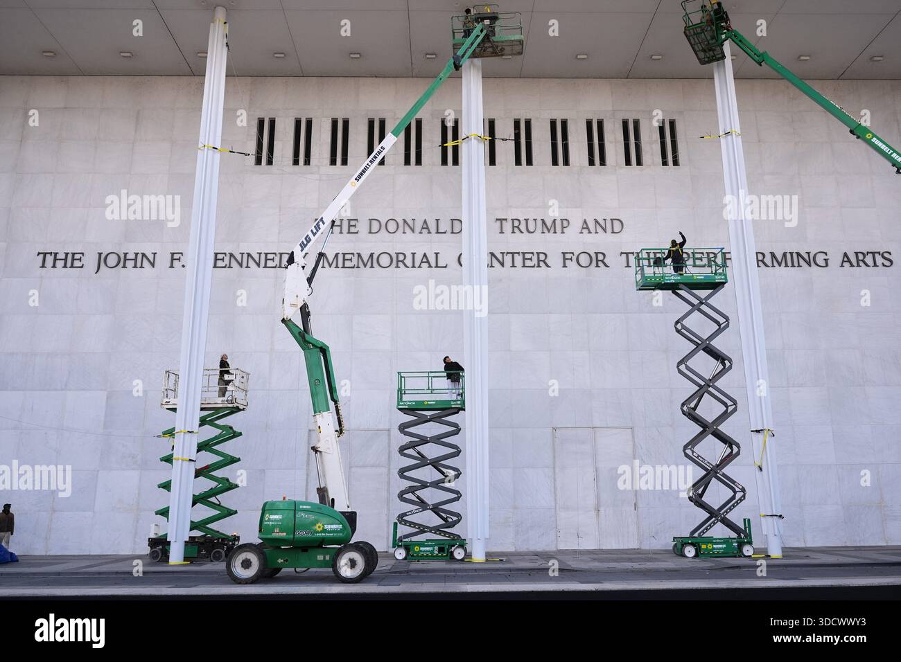 FILE - New signage, The Donald J. Trump and The John F. Kennedy ...