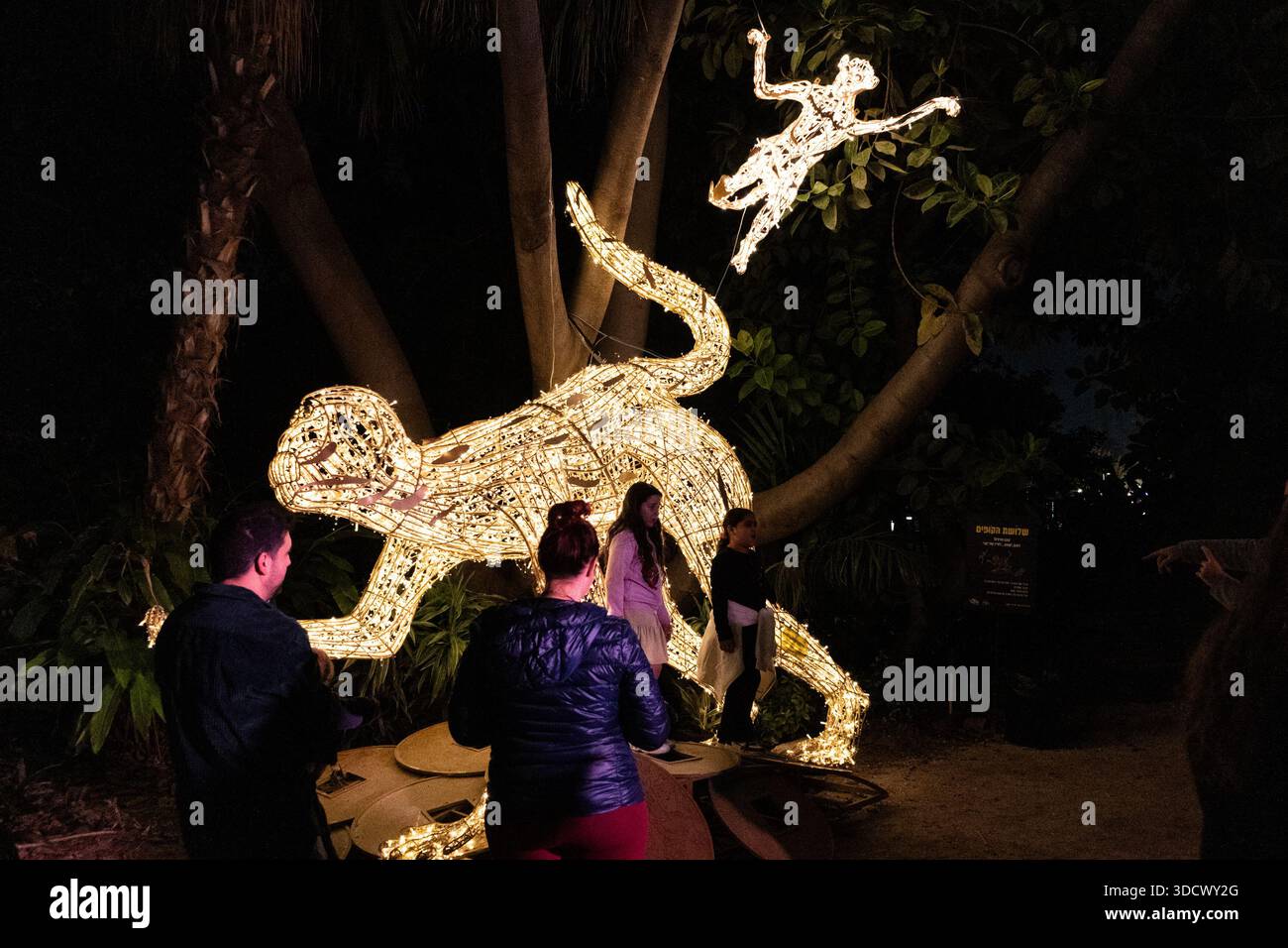 People attend LUMAGICA Holidays light show at Yarkon Park in Tel Aviv ...