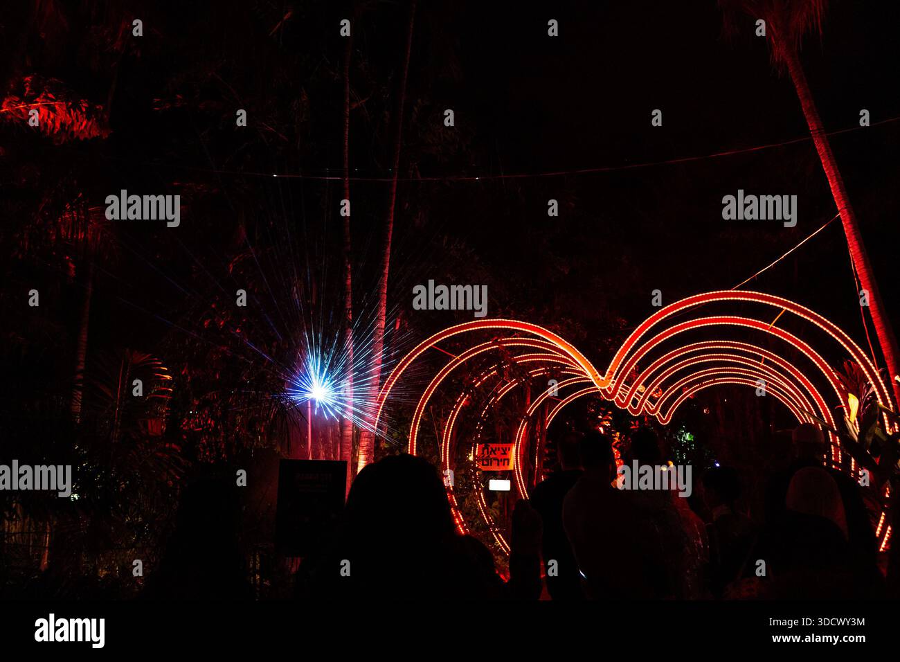 People attend LUMAGICA Holidays light show at Yarkon Park in Tel Aviv ...