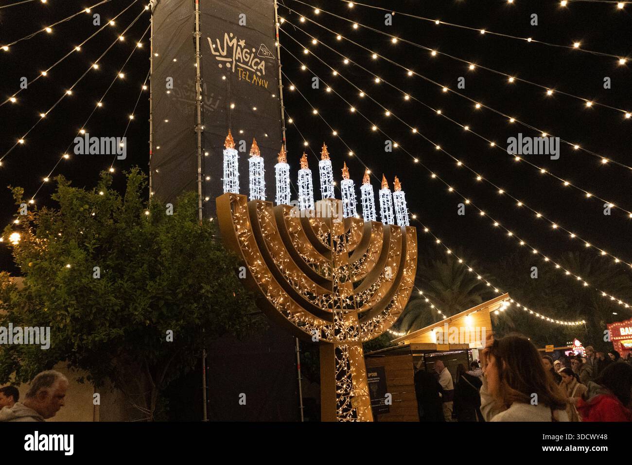 People attend LUMAGICA Holidays light show at Yarkon Park in Tel Aviv ...