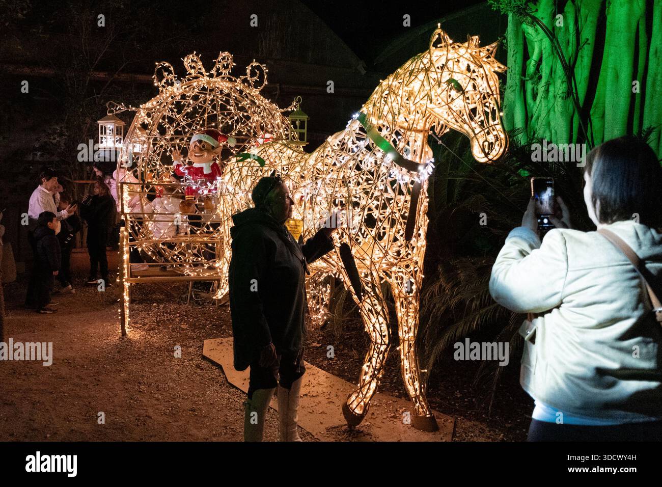 People attend LUMAGICA Holidays light show at Yarkon Park in Tel Aviv ...