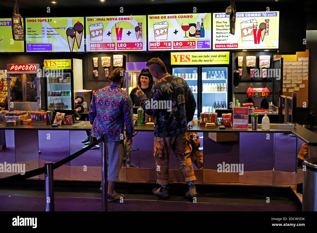 People are seen purchasing movie tickets and snacks at Cinema Nova, in ...