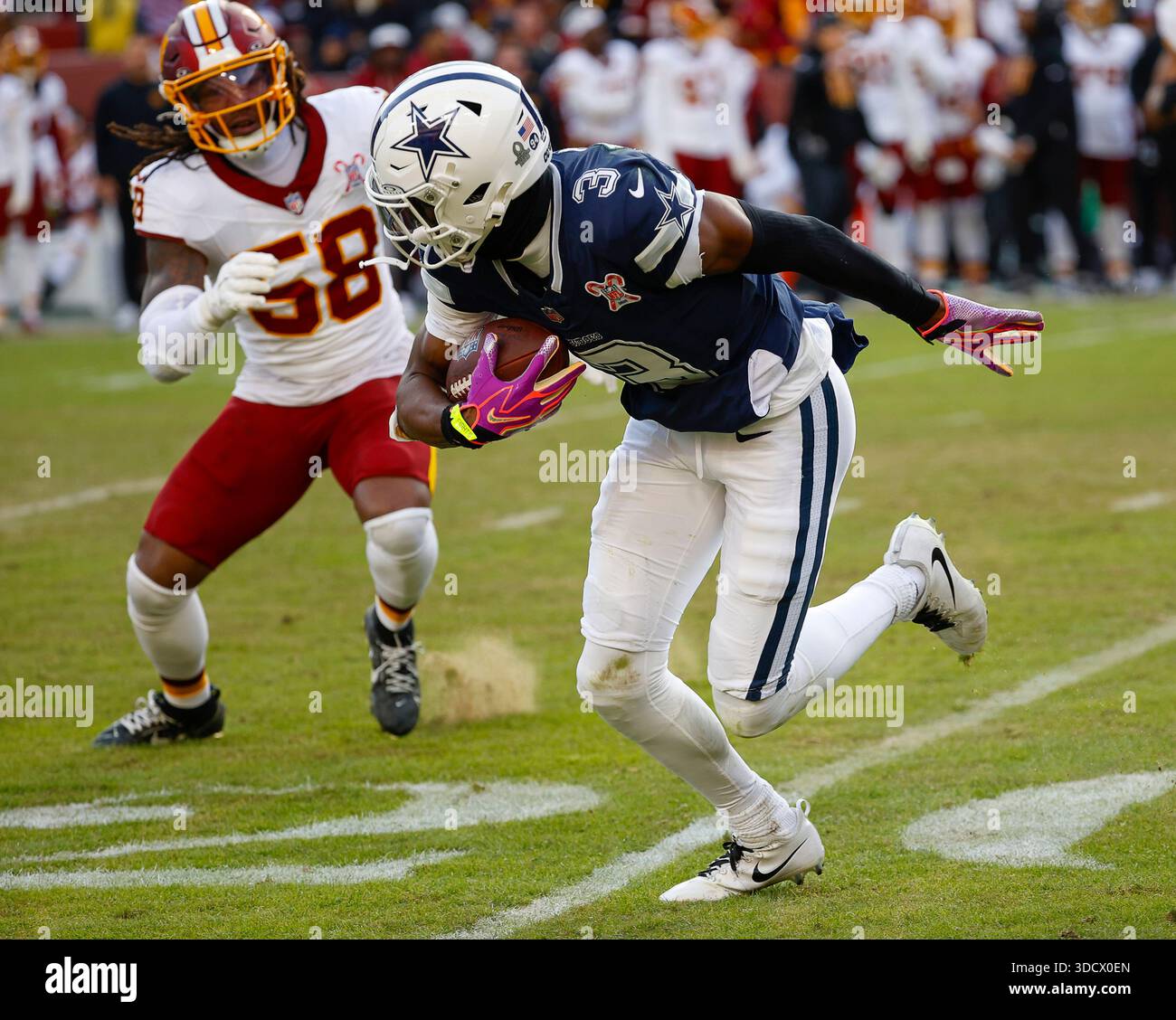 Dec 25, 2025: Dallas Cowboys WR #3 George Pickens tries to run from ...