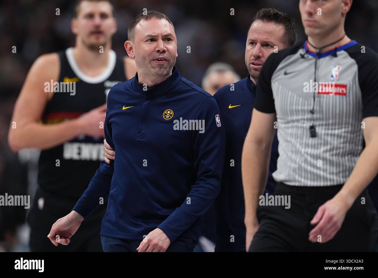 Denver Nuggets head coach David Adelman reacts after being ejected in ...